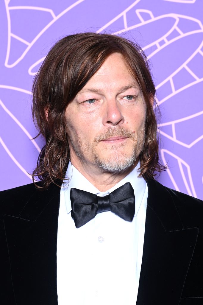 Emily Kinney En Norman Reedus Kussen Elkaar